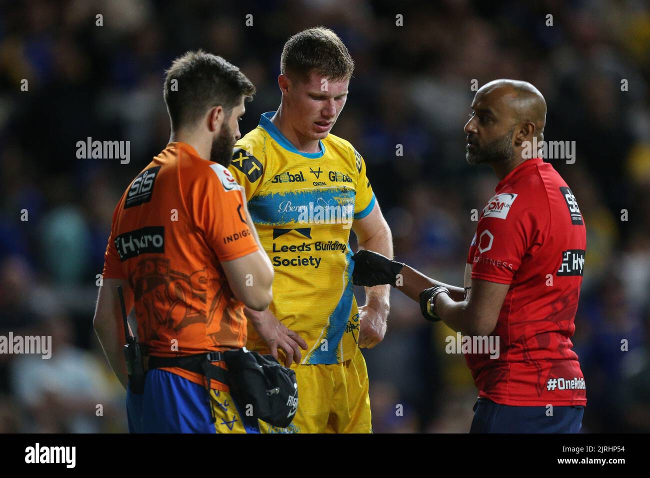 Morgan Gannon #21 of Leeds Rhinos receives medical attention in the ...
