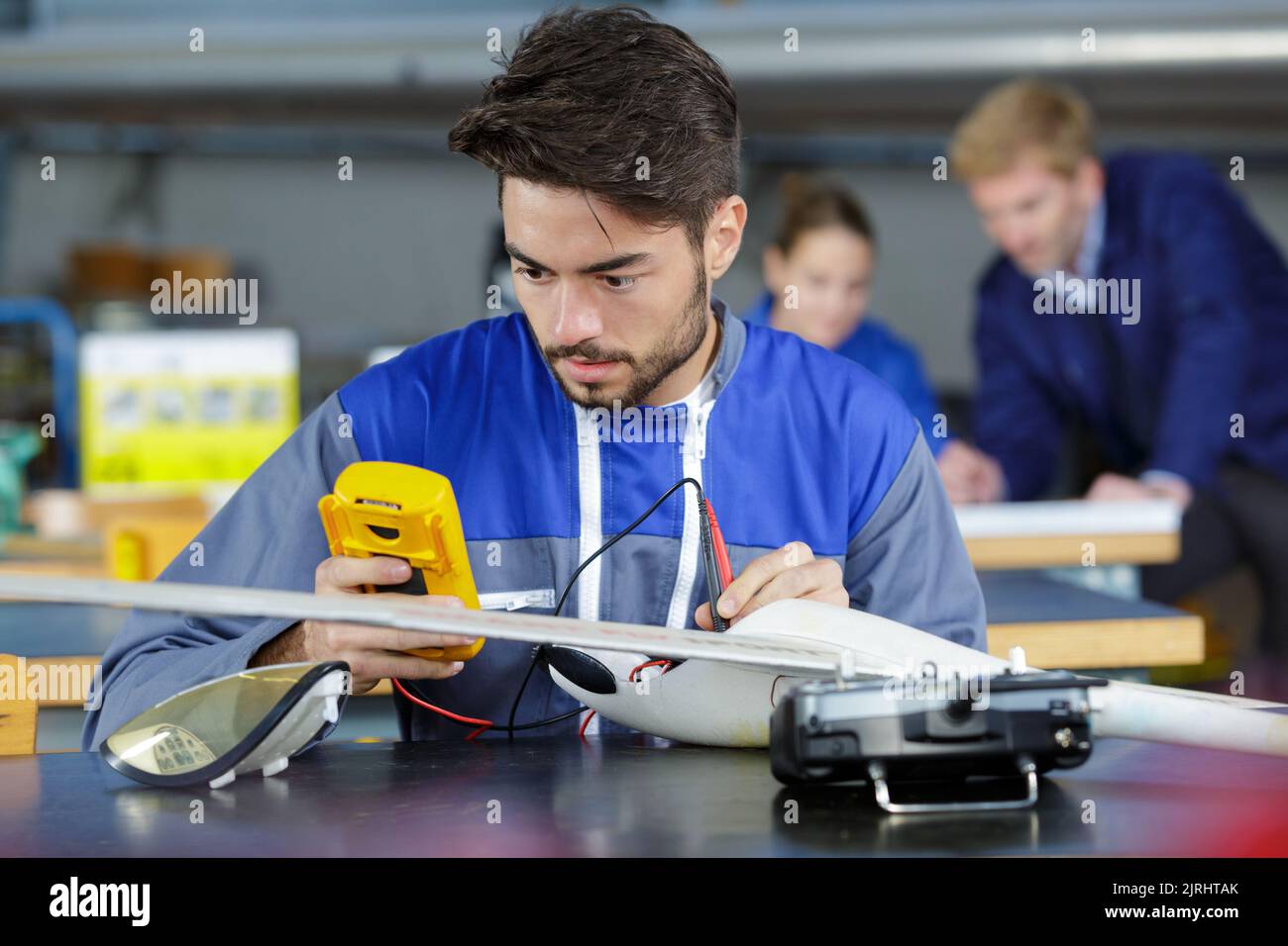 portrait of man measures the voltage Stock Photo - Alamy