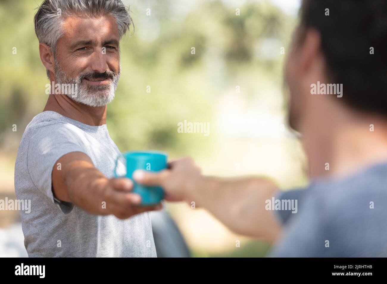 Father son drinking tea hi-res stock photography and images - Alamy