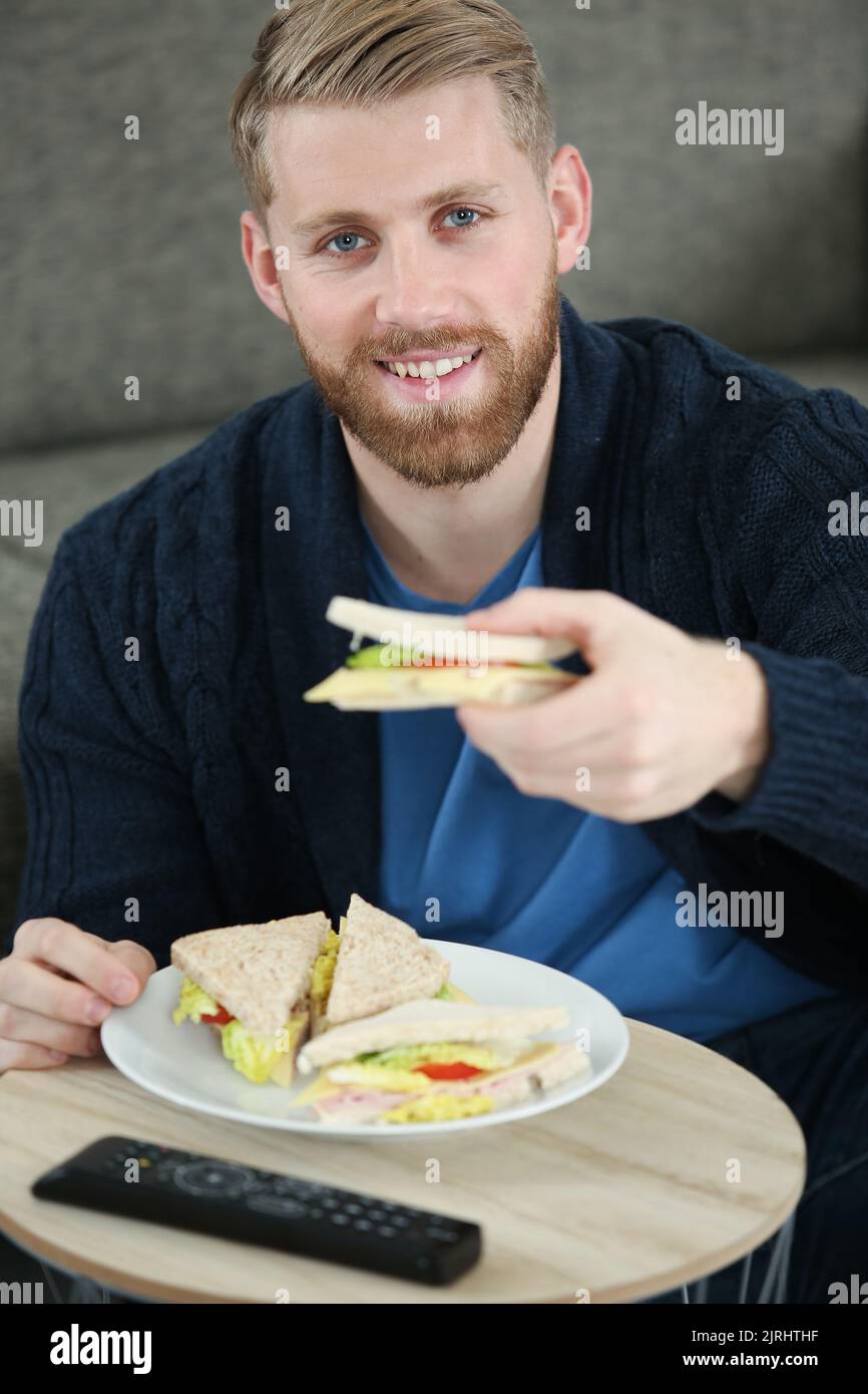 Bearded man eating burger hi-res stock photography and images - Alamy