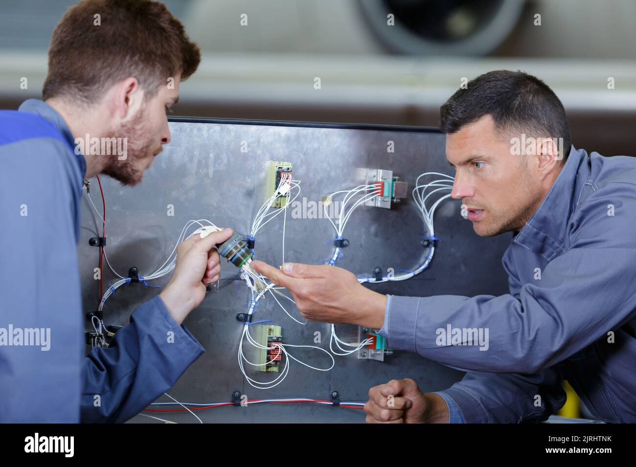 engineer working on checking and maintenance equipment Stock Photo - Alamy