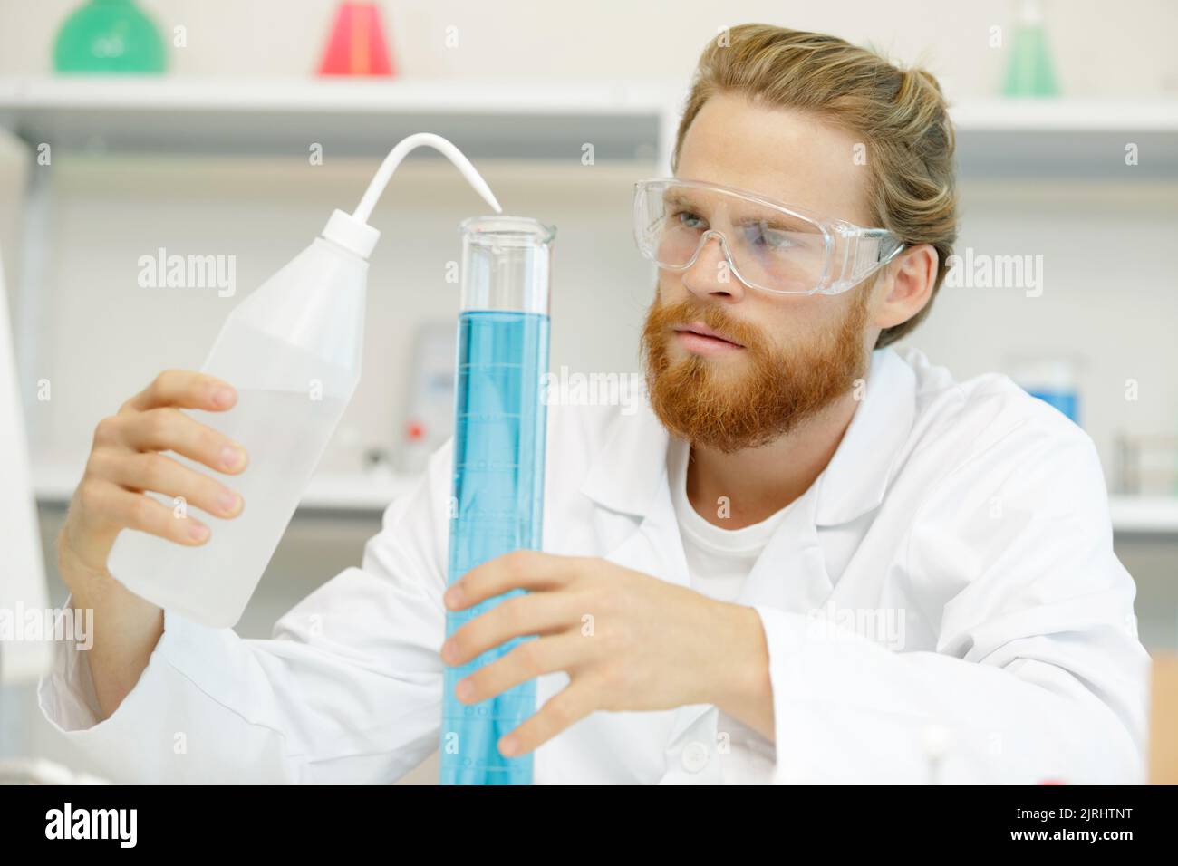 testing different liquids in lab Stock Photo - Alamy