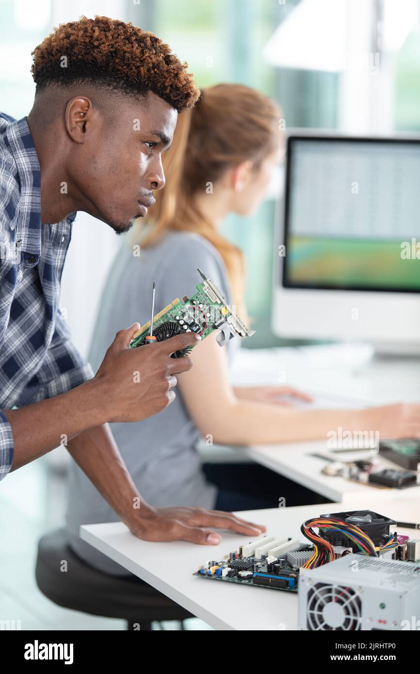 man does not know how to repair a computer Stock Photo - Alamy
