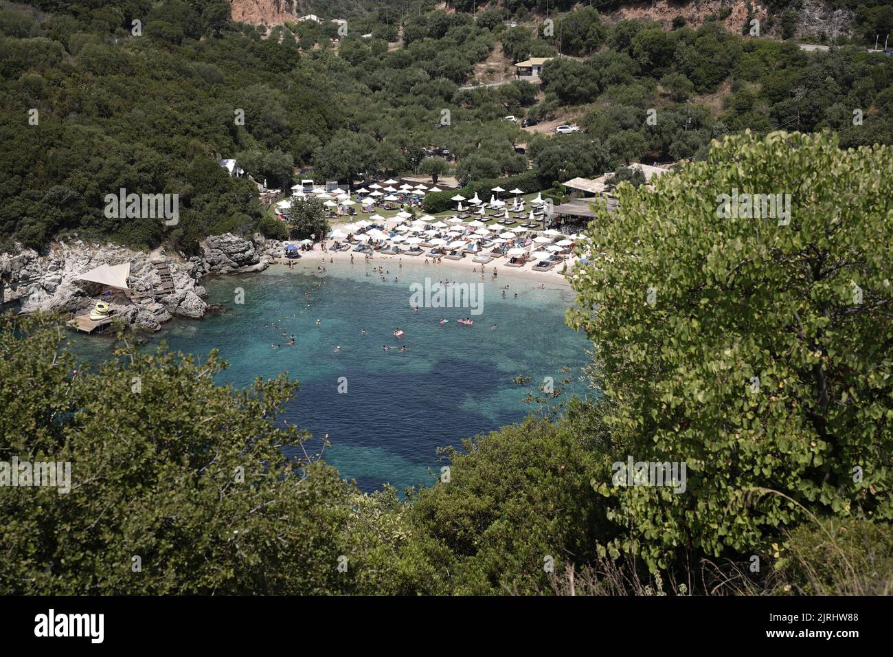 Sivota, Epirus, Greece. Mikri Ammos Beach Crowded With Tourists Stock ...