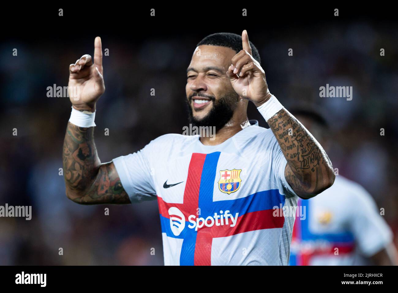 Memphis Depay of FC Barcelona celebrate a goal during the benefic ...