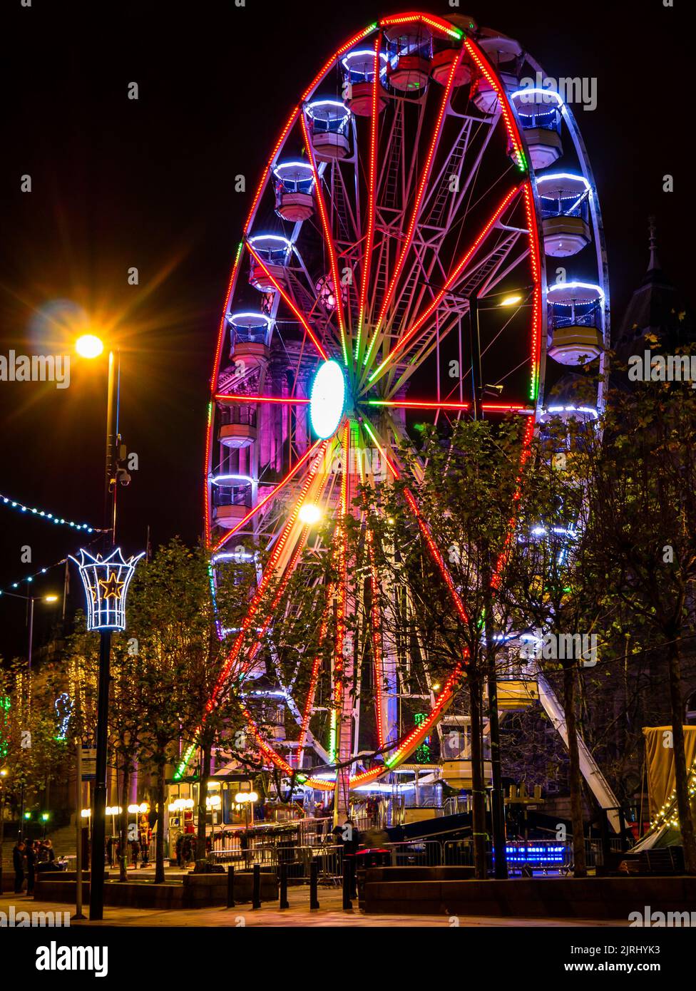 Leeds Wheel Of Light - Ferris wheel lit up during the night Stock Photo ...