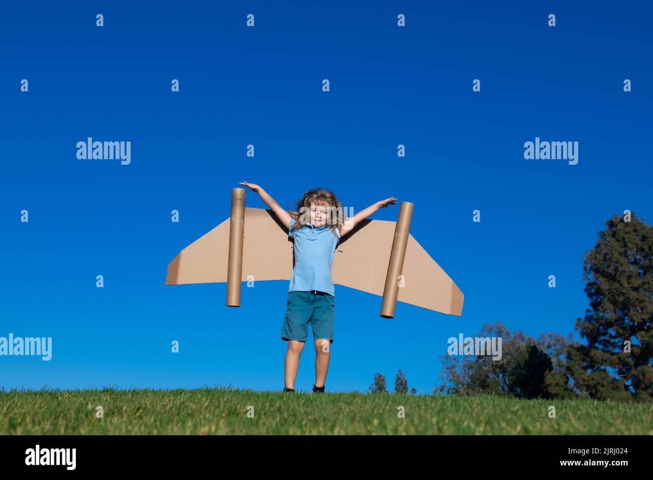 Happy boy playing toy jetpack hi-res stock photography and images - Alamy
