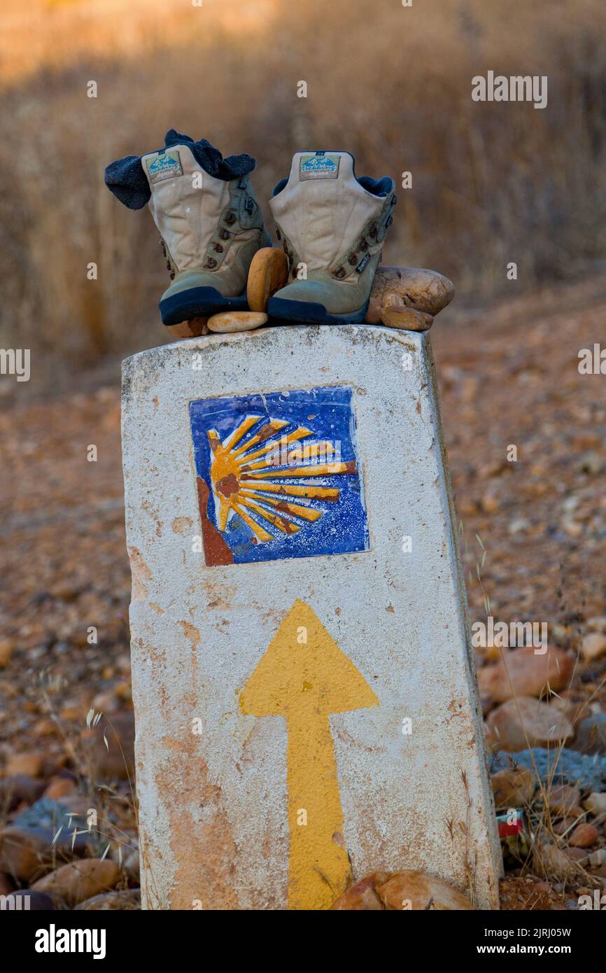 Camino to Santiago; Route Marker, scallop shell and yellow arrow on ...