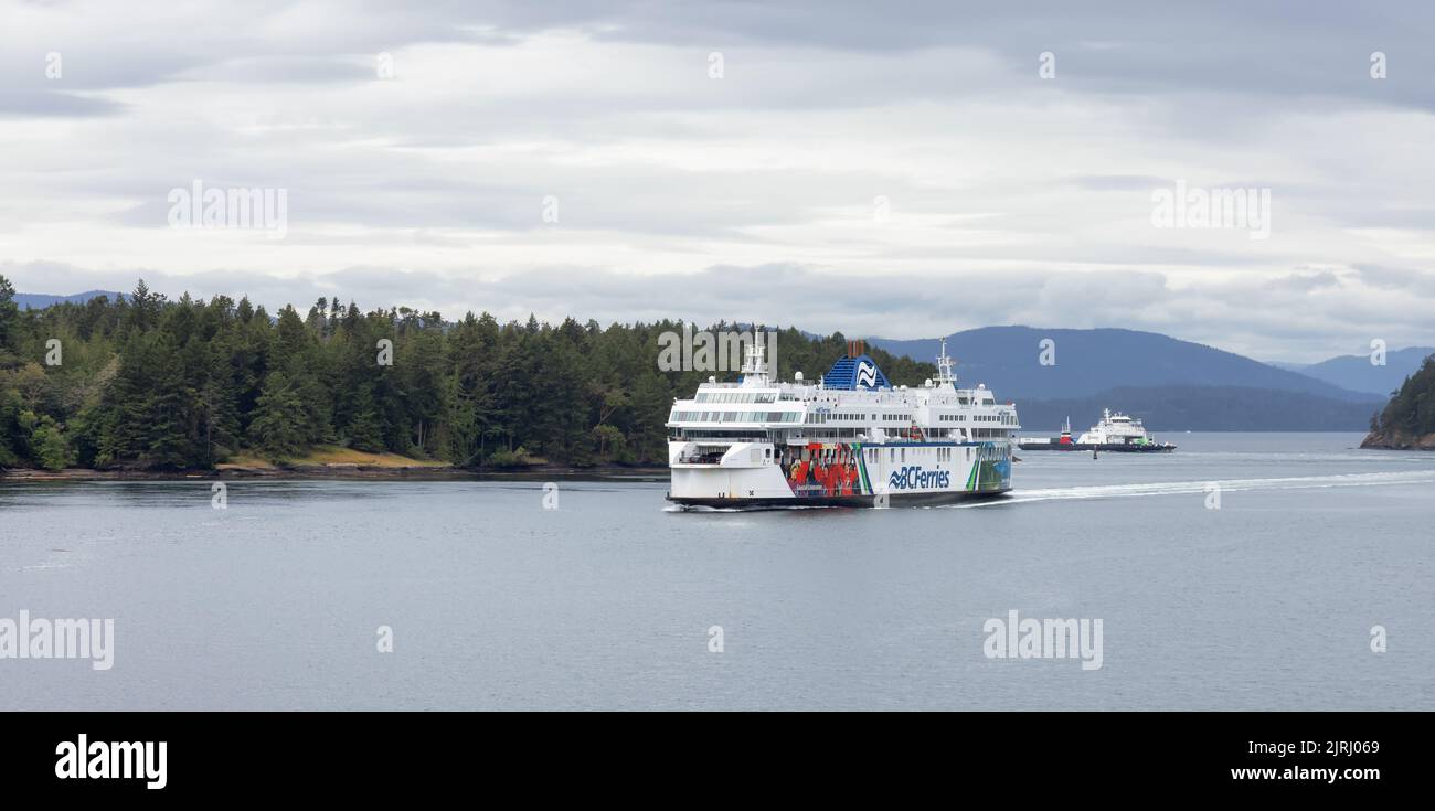 BC Ferries Boat in Pacific Ocean during cloudy summer day Stock Photo ...