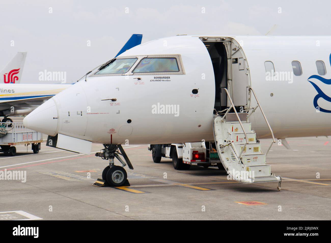 An airplane in the airport getting ready for a take off Stock Photo - Alamy