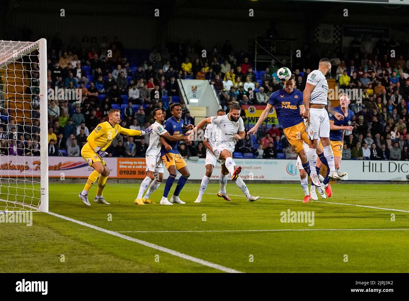 Chris Wood #20 of Newcastle United heads home to make the score 2-1 and ...