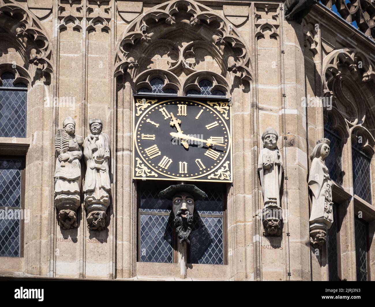 The Platz Jabbeck man with a red tongue below the City Hall Clock ...