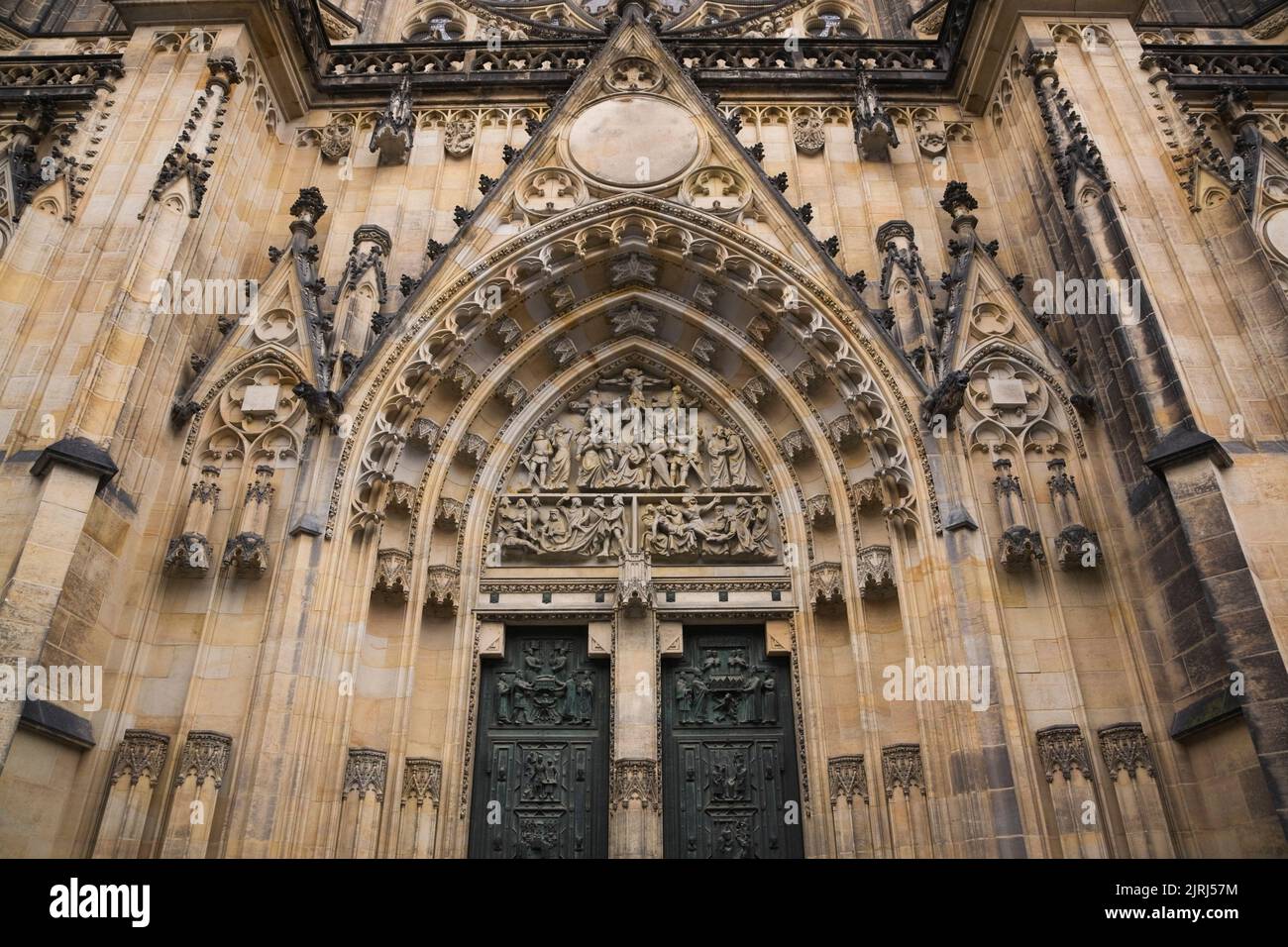 The 14th century gothic style facade of the Saint-Vitus Cathedral ...