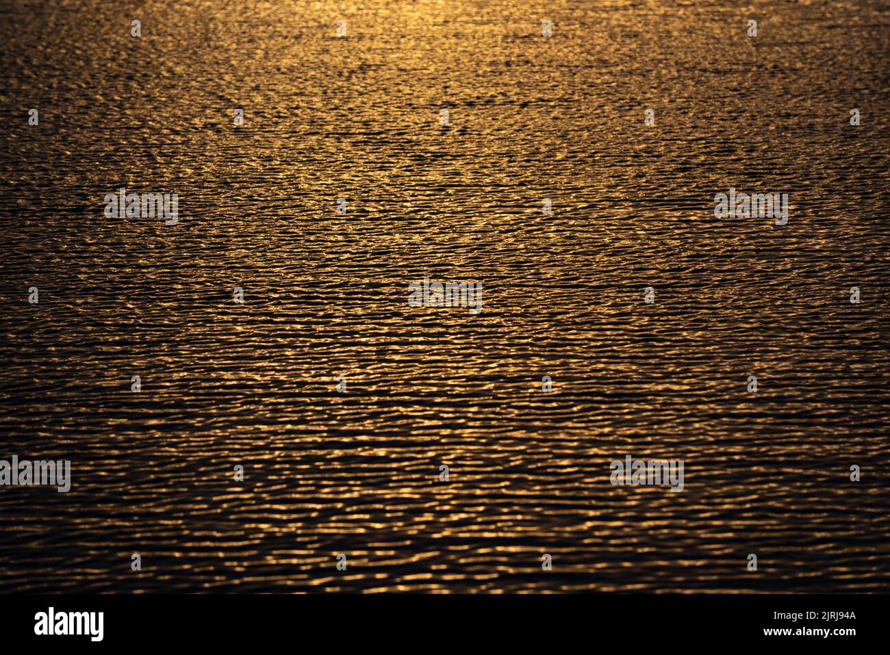 Sunrise sea water background. Reflection of sun in the ocean water ...