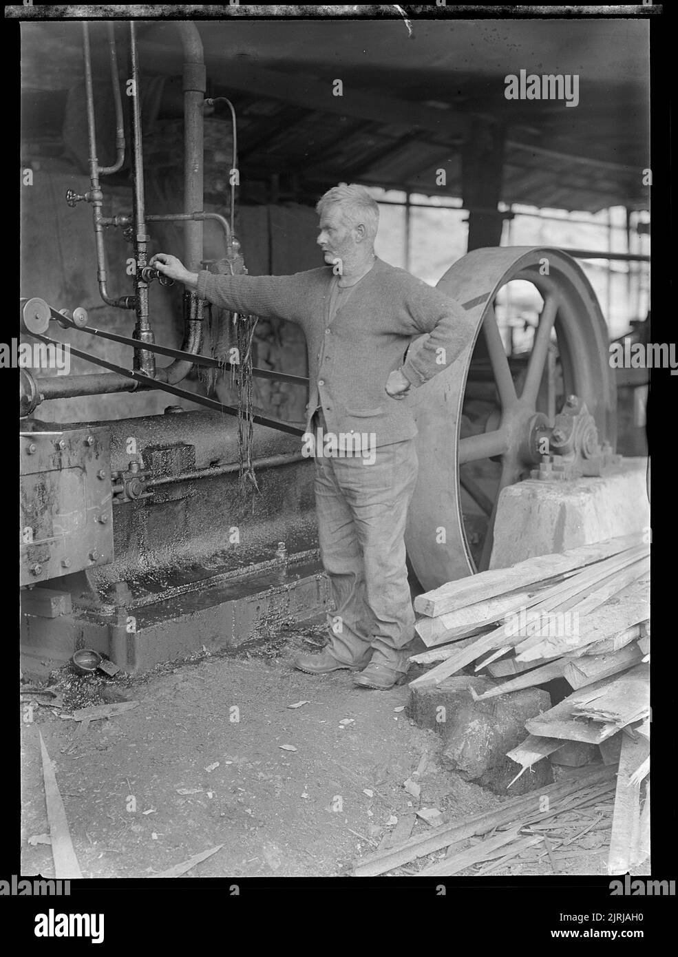 Workman inside saw mill workman inside saw mill hi-res stock ...