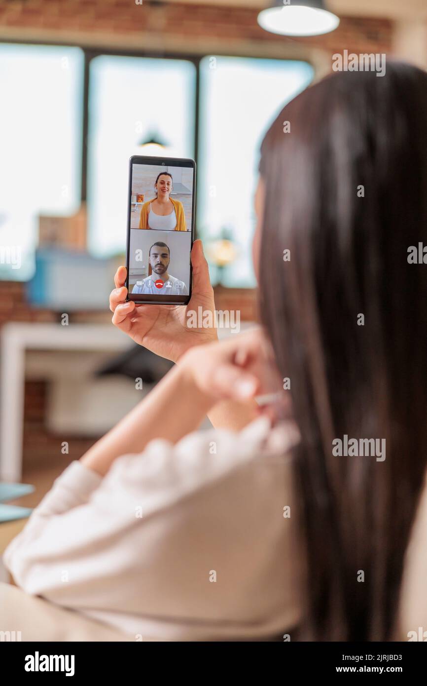 Authentic busy asian woman on video call meeting online communication ...