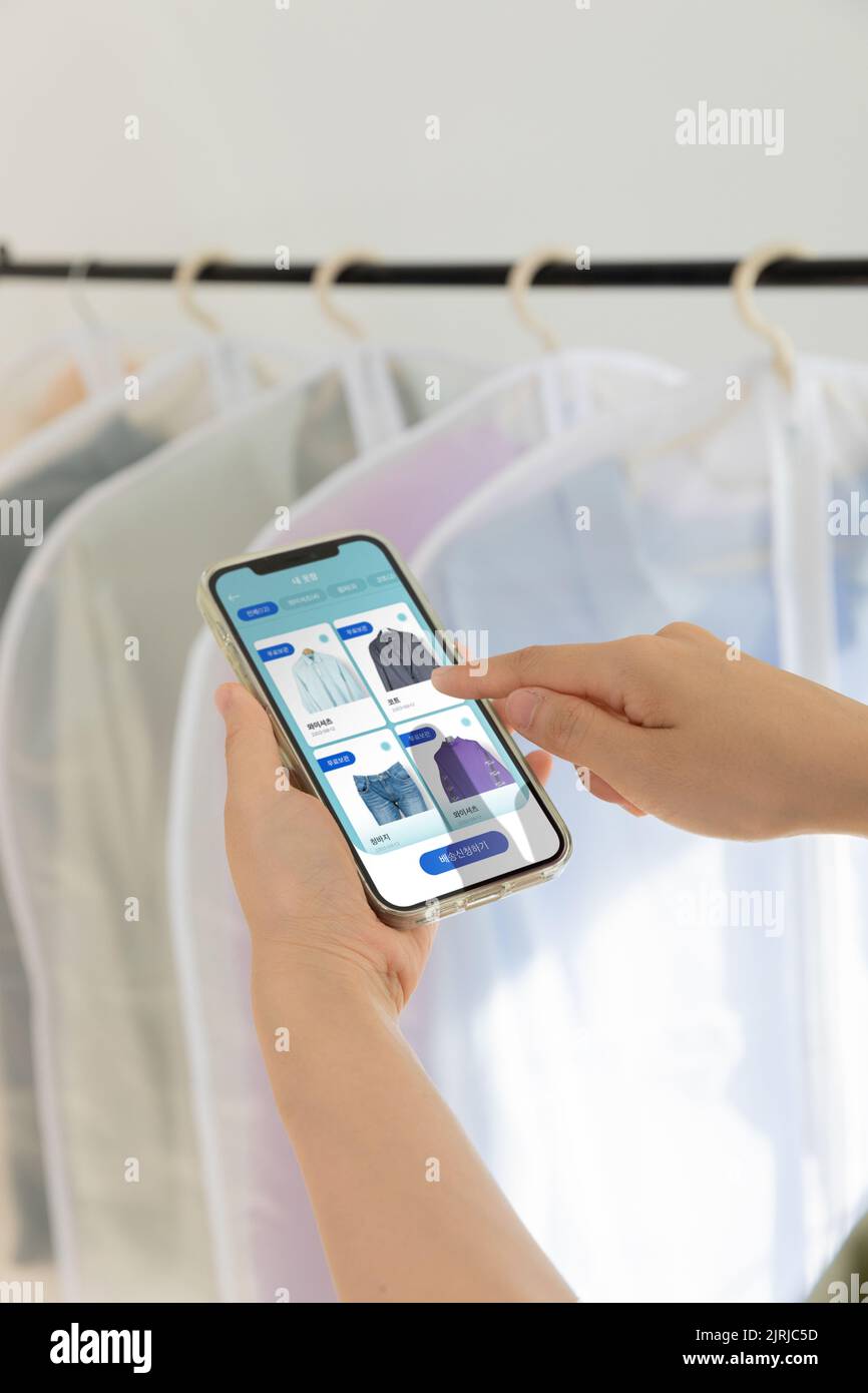 aesthetic laundry concept laundry service app in smartphone, clothes ...