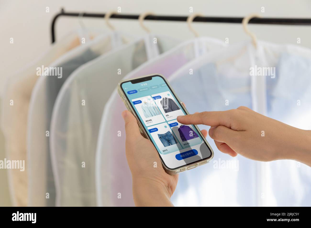 aesthetic laundry concept laundry service app in smartphone, clothes ...