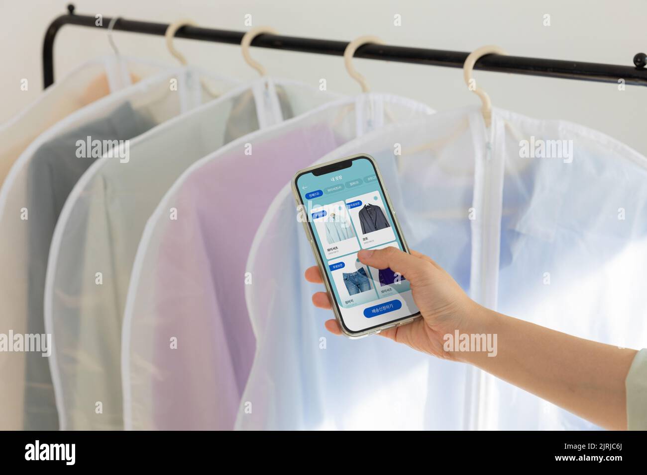 aesthetic laundry concept laundry service app in smartphone, clothes ...