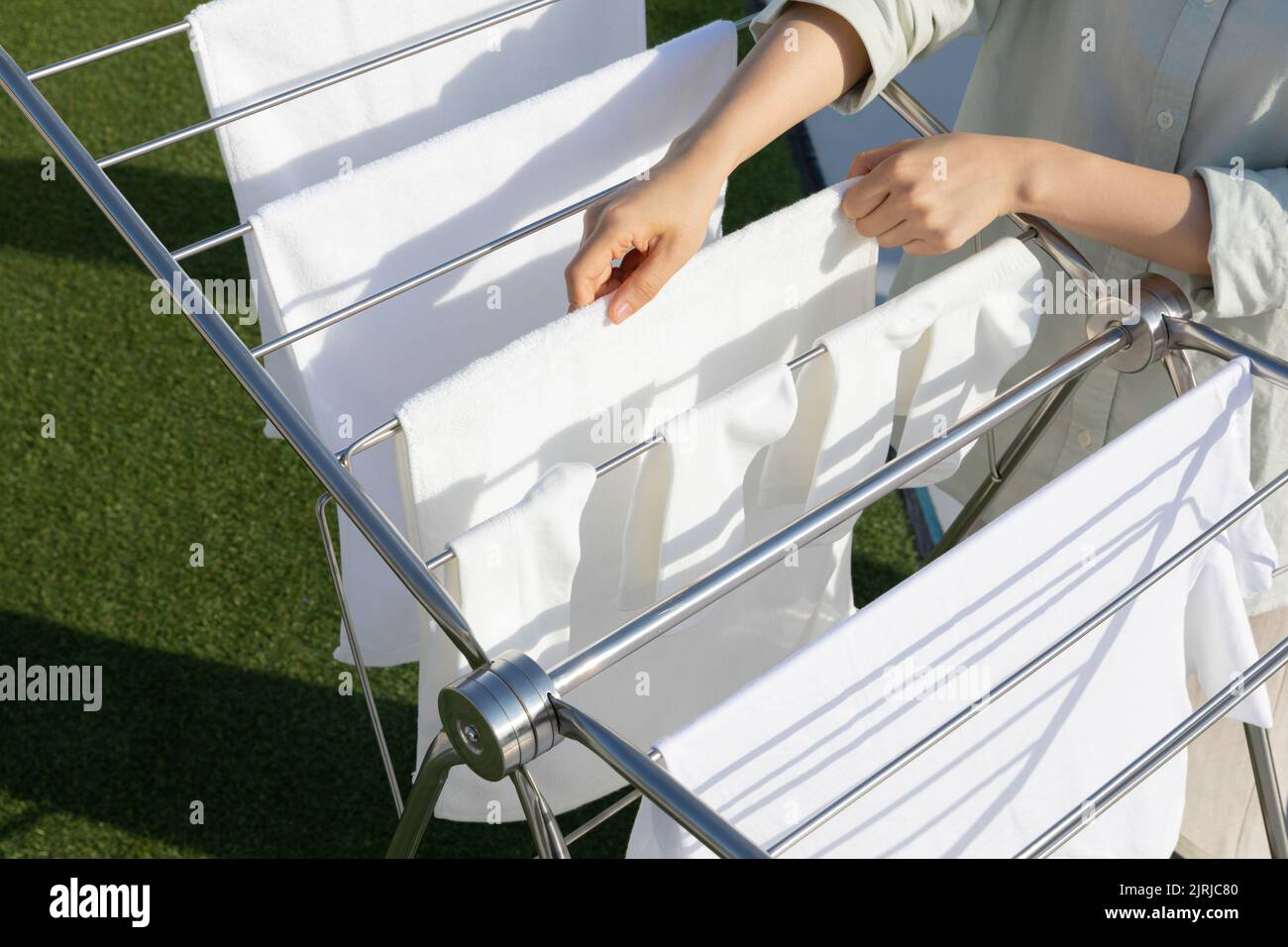 aesthetic laundry concept drying clothes outside Stock Photo - Alamy