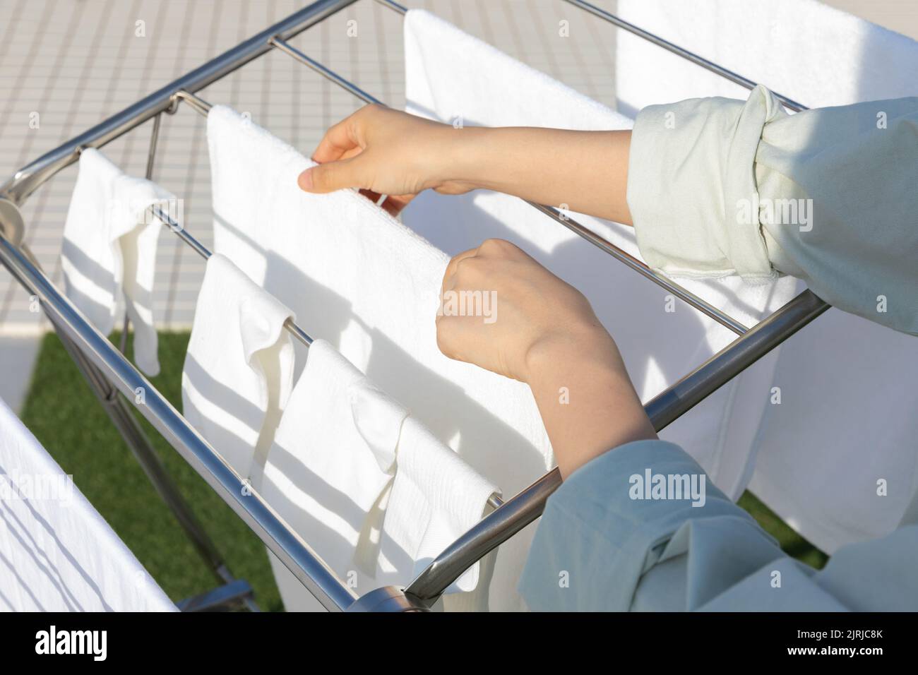 aesthetic laundry concept drying clothes outside Stock Photo - Alamy