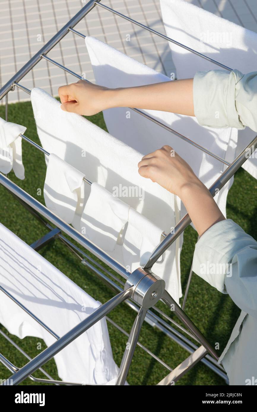 aesthetic laundry concept drying clothes outside Stock Photo - Alamy