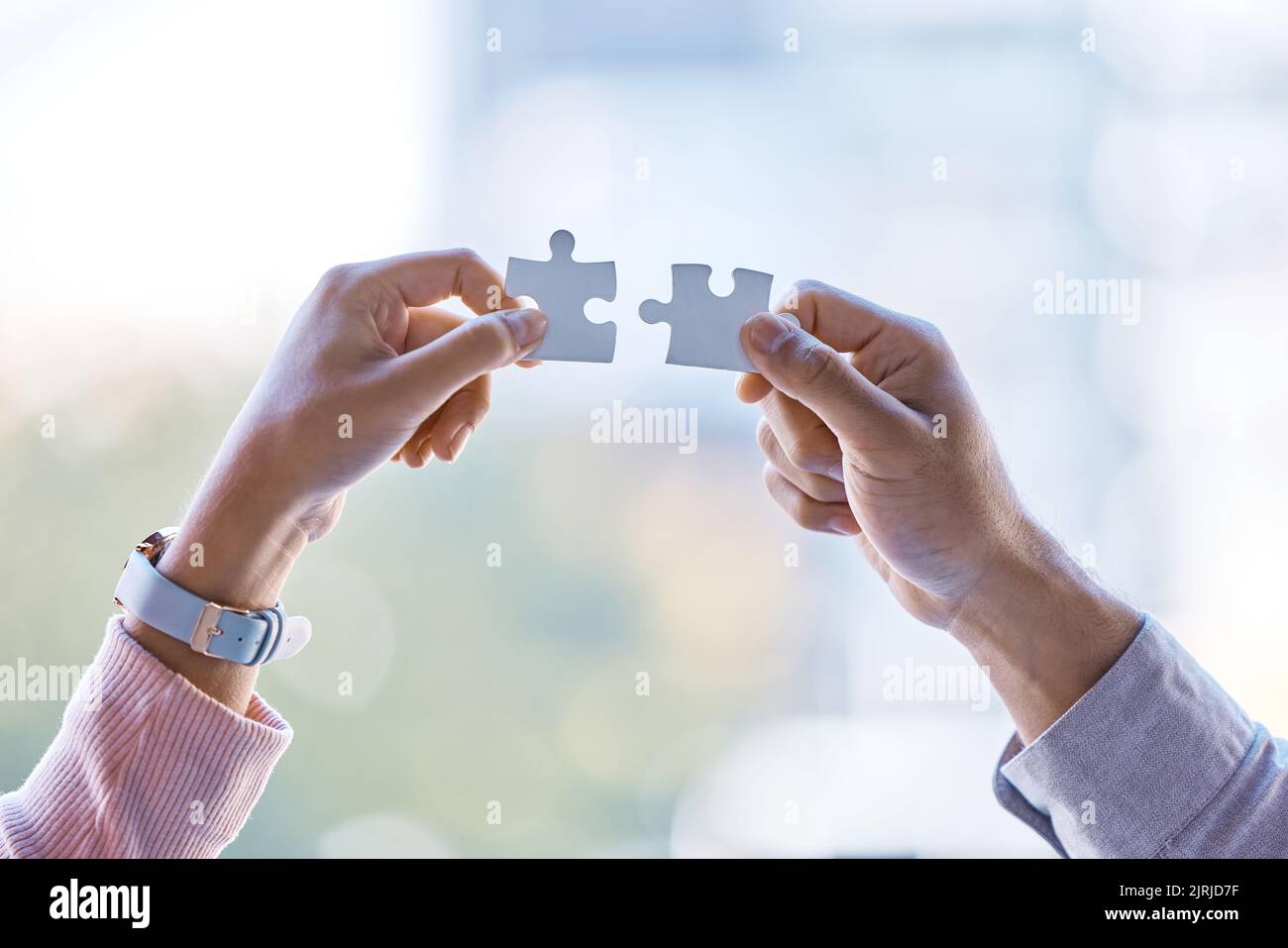 Puzzle, collaboration and teamwork between business people hands after ...
