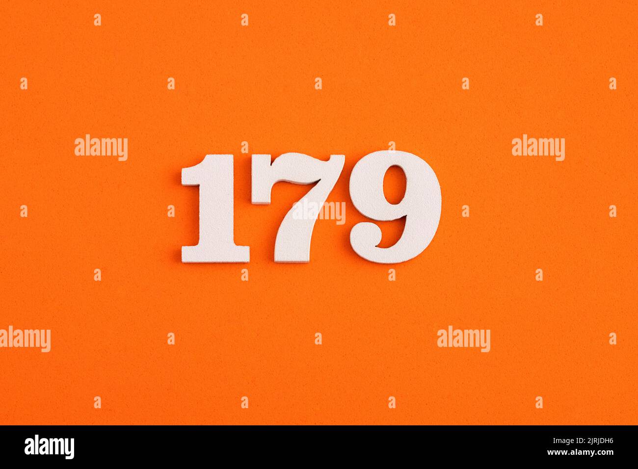 Number 179 - On orange foam rubber background Stock Photo - Alamy