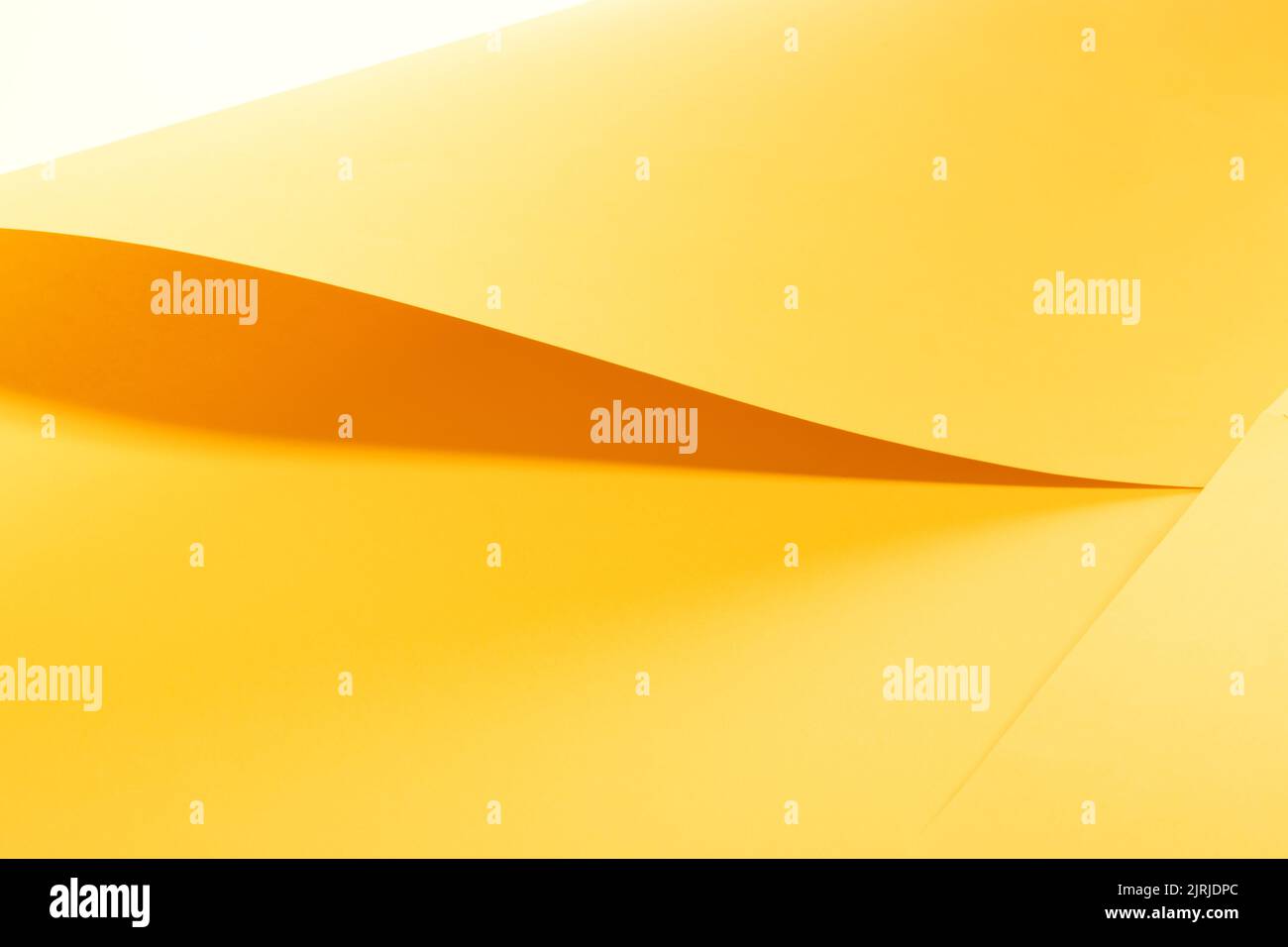 yellow color paper background Stock Photo - Alamy