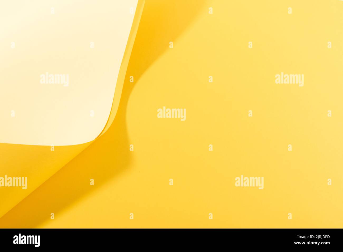 yellow color paper background Stock Photo - Alamy