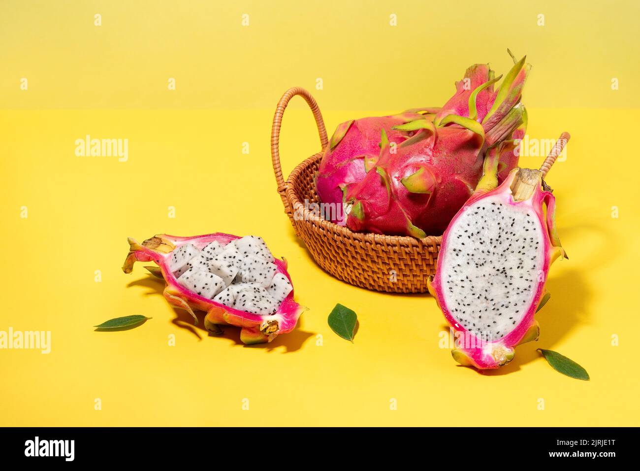 Tropical Fruits Rattan Basket and Dragon fruits Stock Photo - Alamy