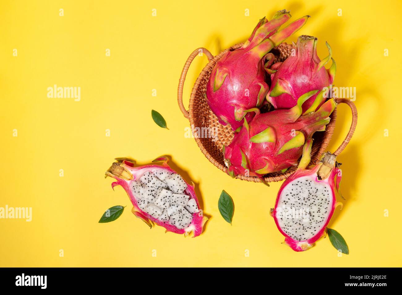 Tropical Fruits Rattan Basket and Dragon fruits Stock Photo - Alamy