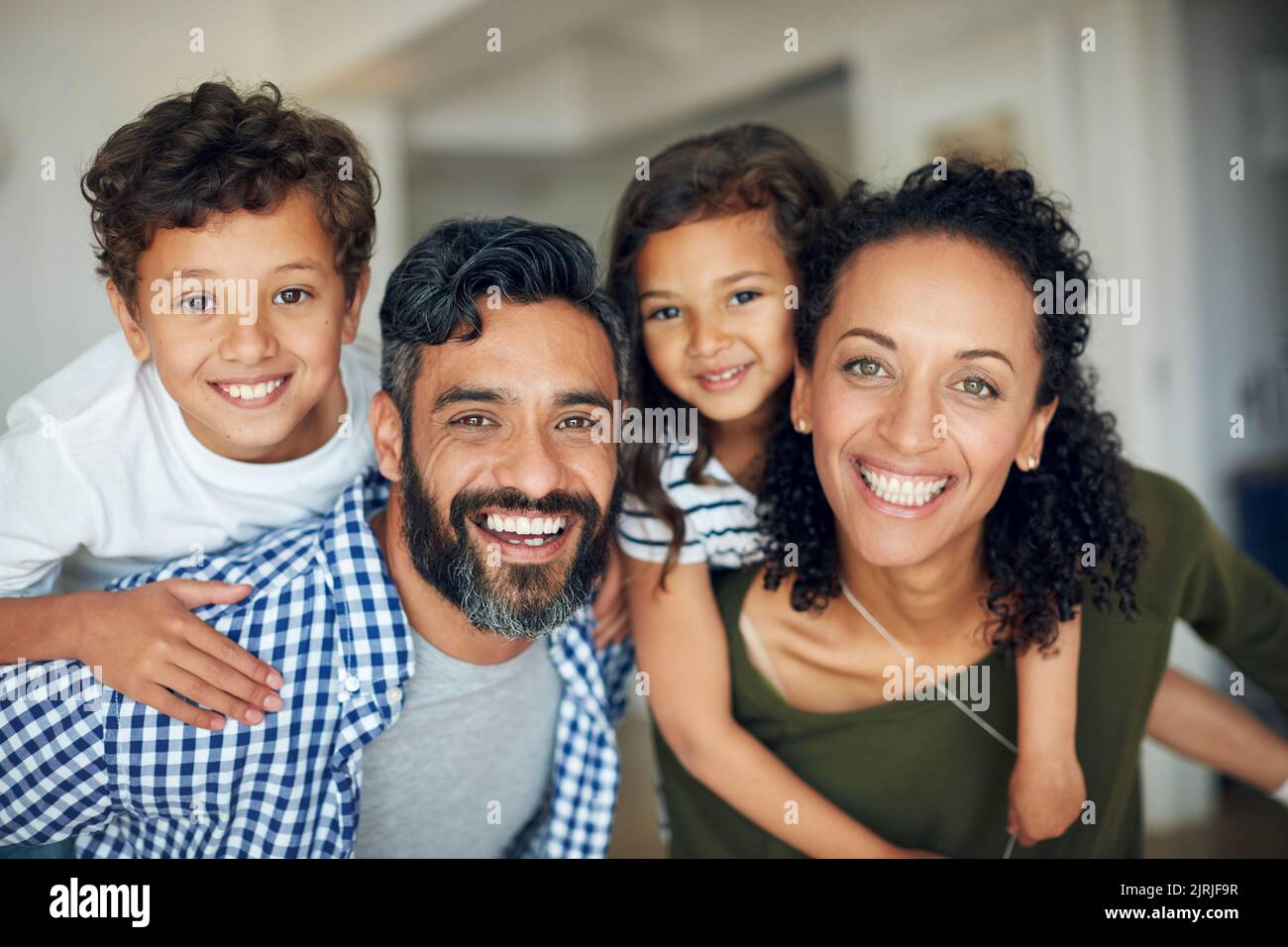 Its love shared beyond words. Portrait of a happy family bonding ...