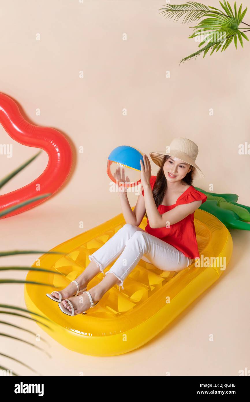 Beautiful young woman floats hi-res stock photography and images - Alamy