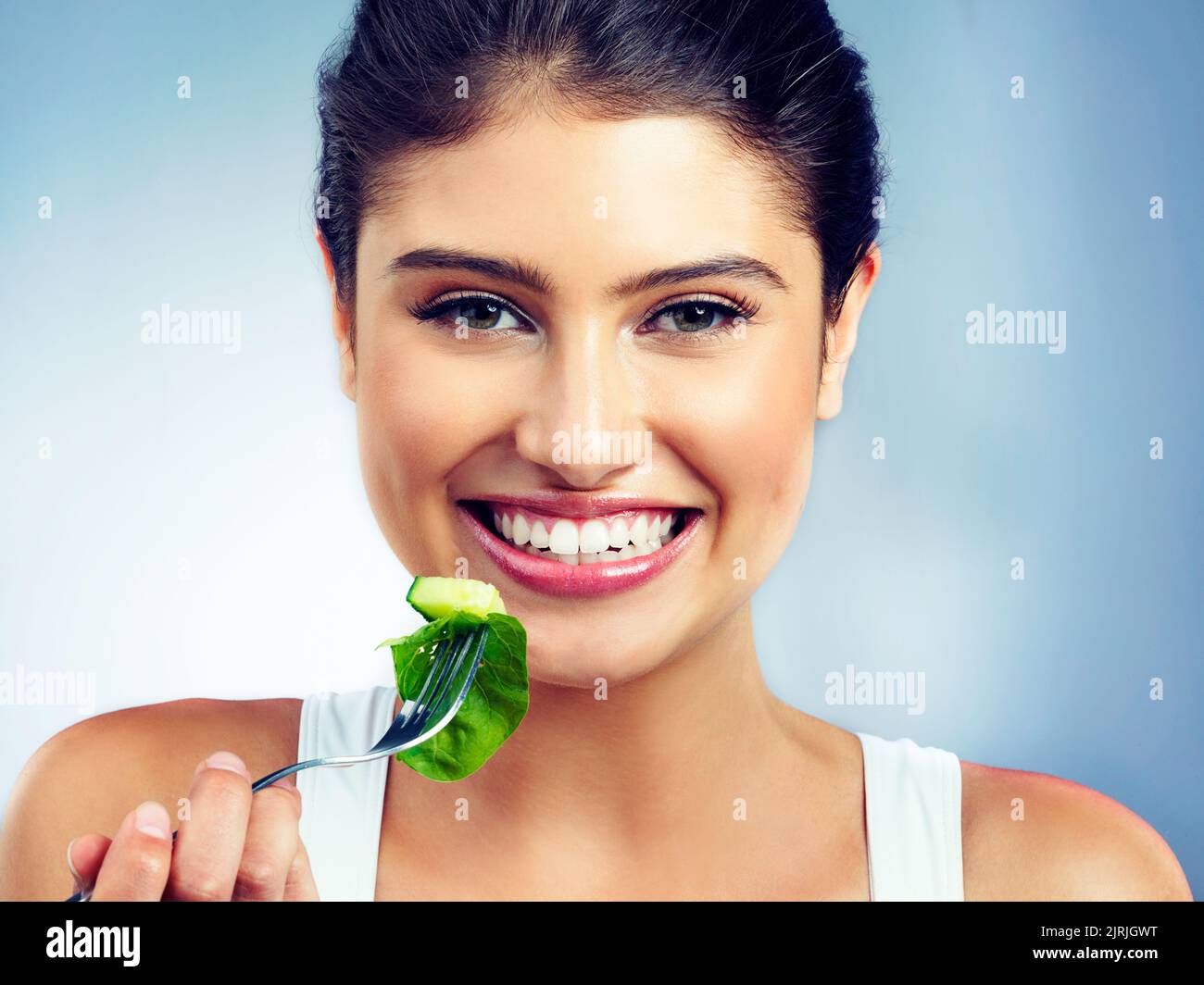 Eat right and the rest will follow. Studio portrait of an attractive ...