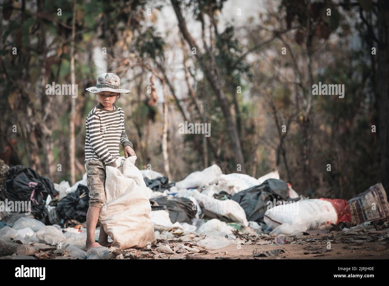 Poor children collect garbage for sale because of poverty, Junk recycle ...