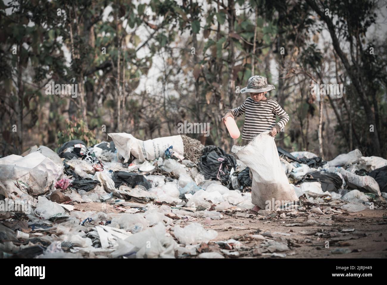 Poor children collect garbage for sale because of poverty, Junk recycle ...
