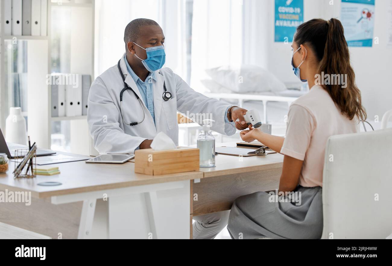 Doctor check fever of sick covid patient to test risk of cold, flu or ...