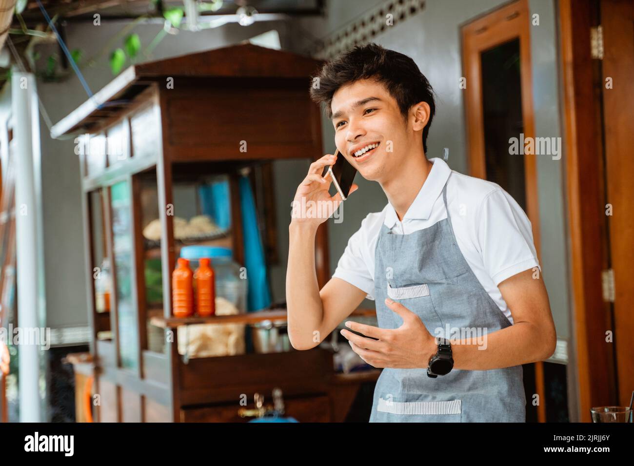 Man makes order online phone hi-res stock photography and images - Alamy