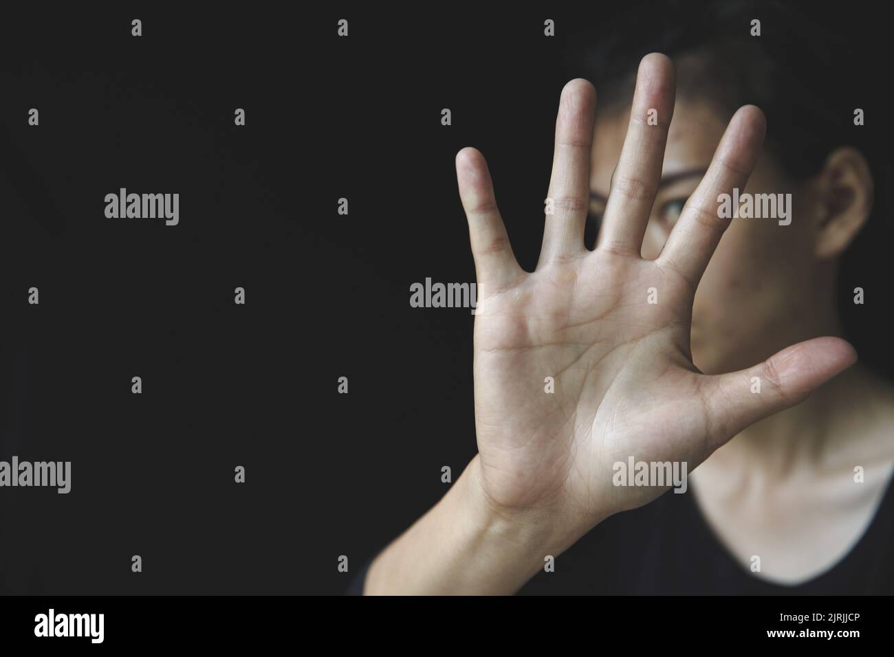 woman making STOP gesture with hand, stop violence against women, human ...