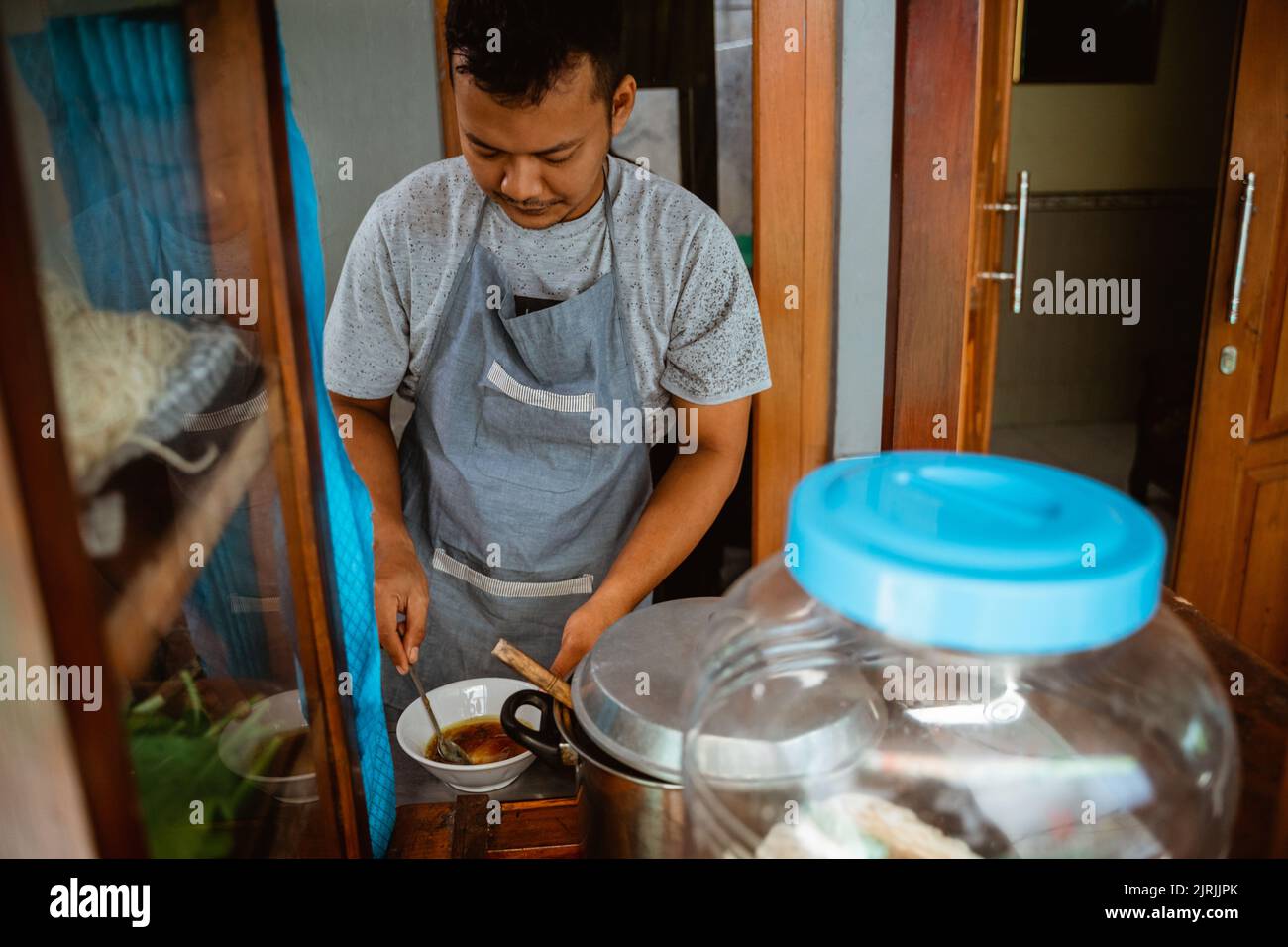 Food stall preparing seasoning chicken hi-res stock photography and ...
