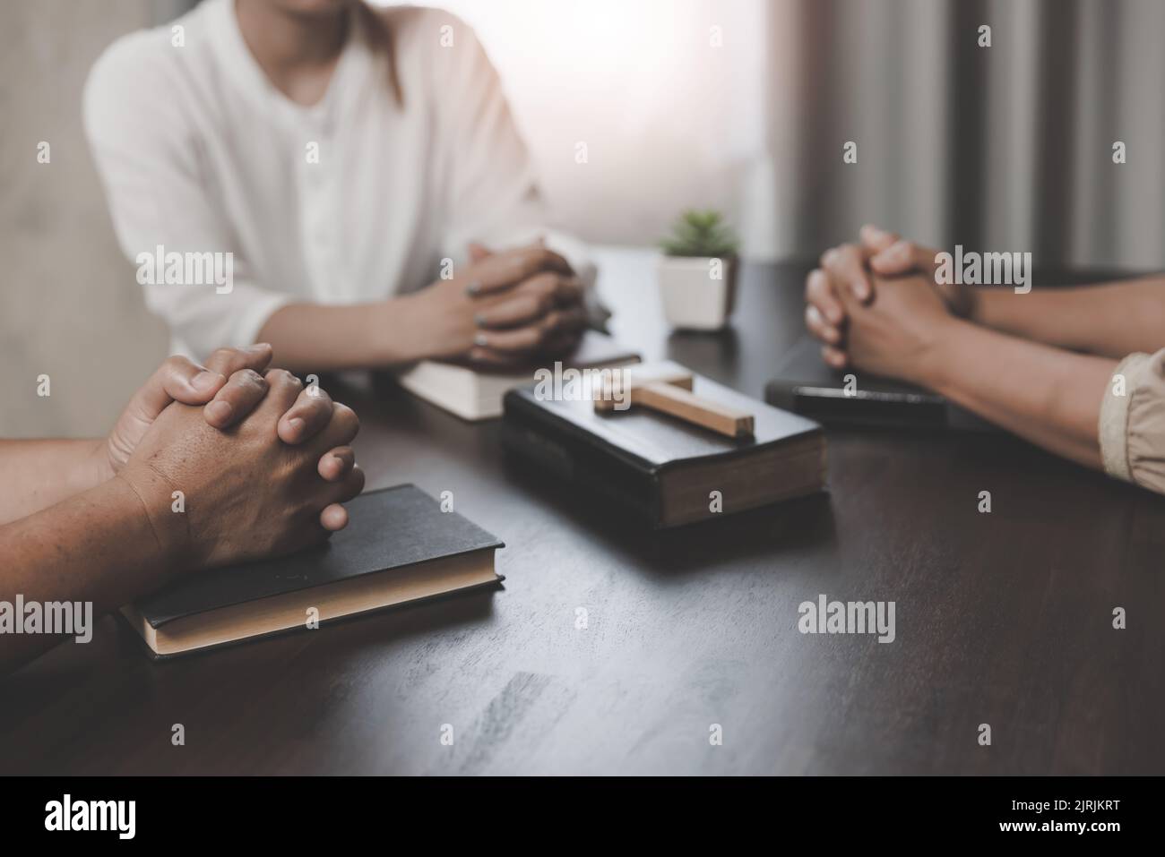 Christian concept. Put your hands on the Bible and pray to God. Study ...