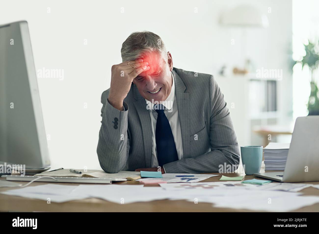 Man with headache holding head hi-res stock photography and images - Alamy
