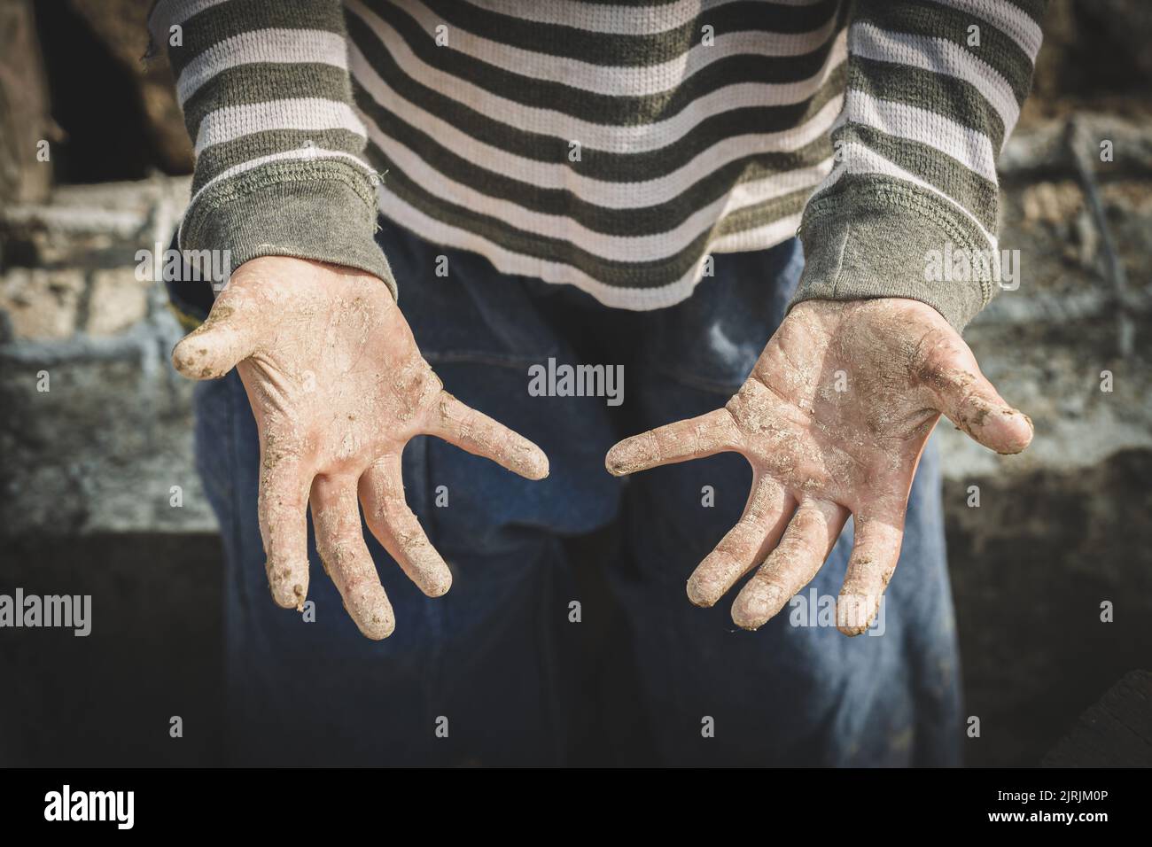 Stained hands are forced to work. The concept of anti-child labor. The ...