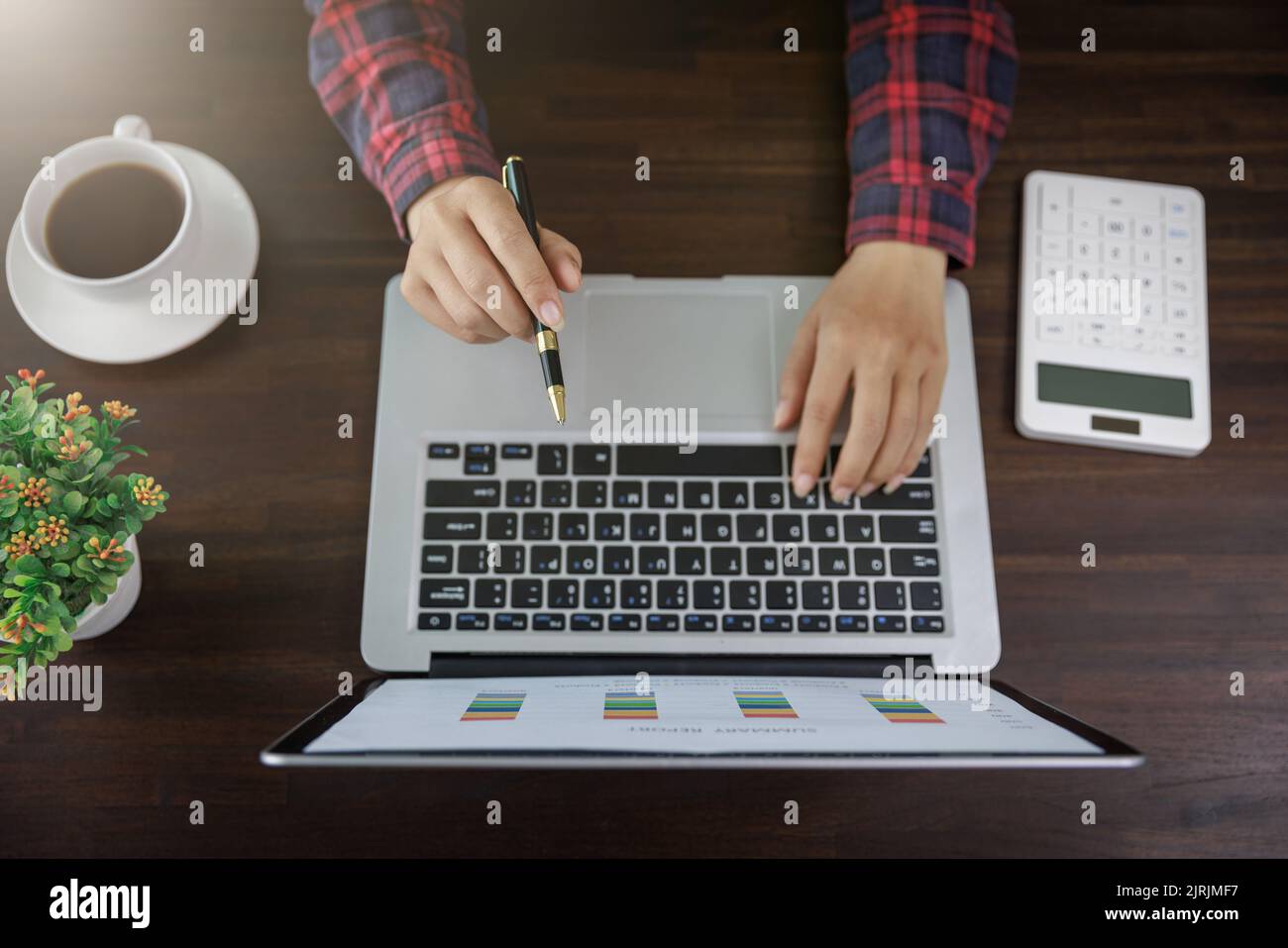 business woman analyze the graph Displays the report screen on the ...