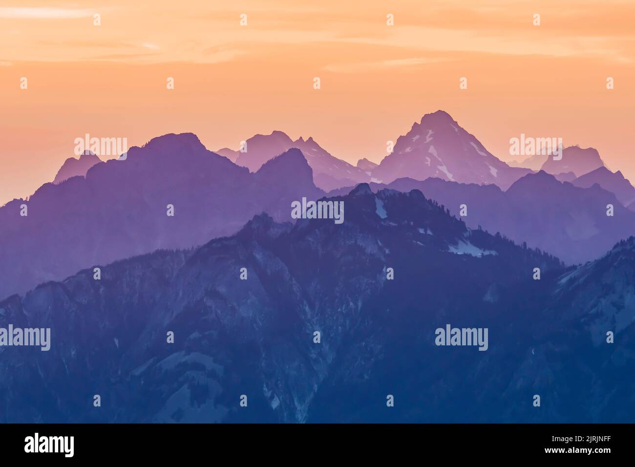 Smoky sunset over the mountains (tallest is Del Campo Peak) viewed from ...