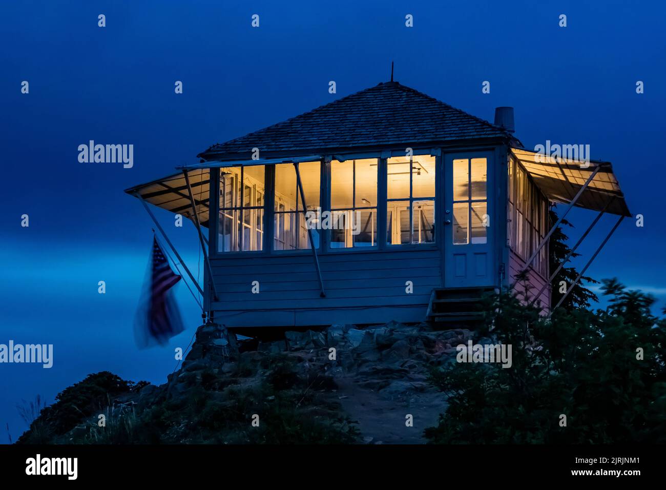 Twilight at Evergreen Mountain Lookout, with visitors renting the ...