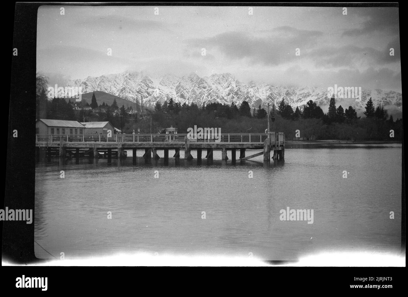 Lake Wakatipu, 1920s-1930s, South Island, by Roland Searle Stock Photo ...