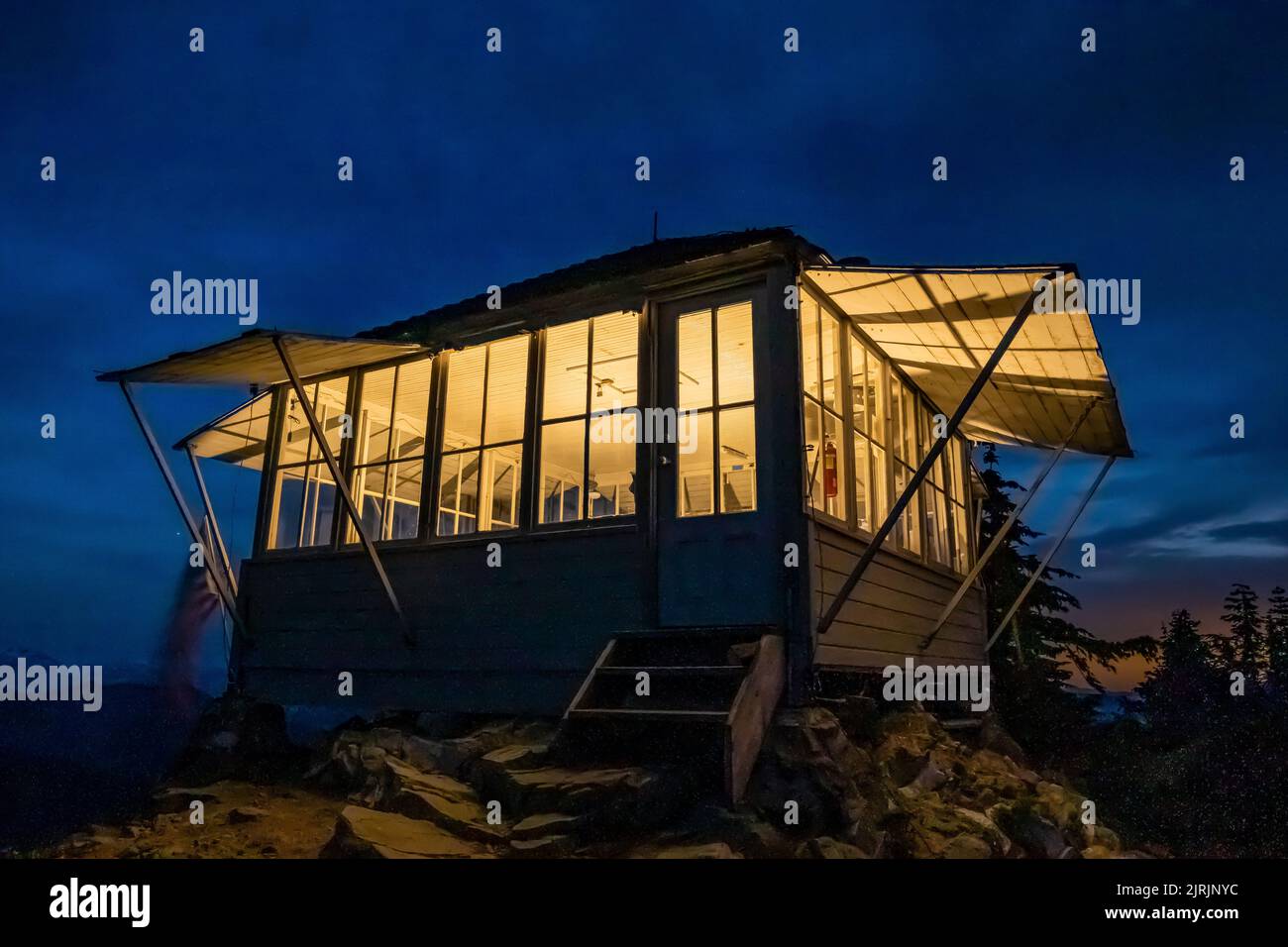 Twilight at Evergreen Mountain Lookout, with visitors renting the ...