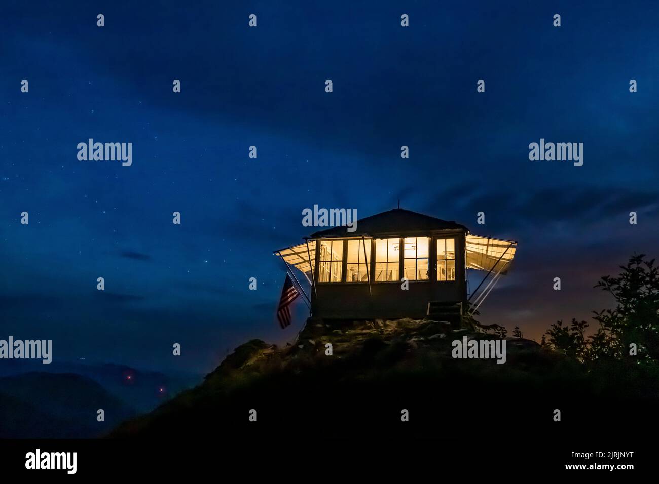 Twilight at Evergreen Mountain Lookout, with visitors renting the ...